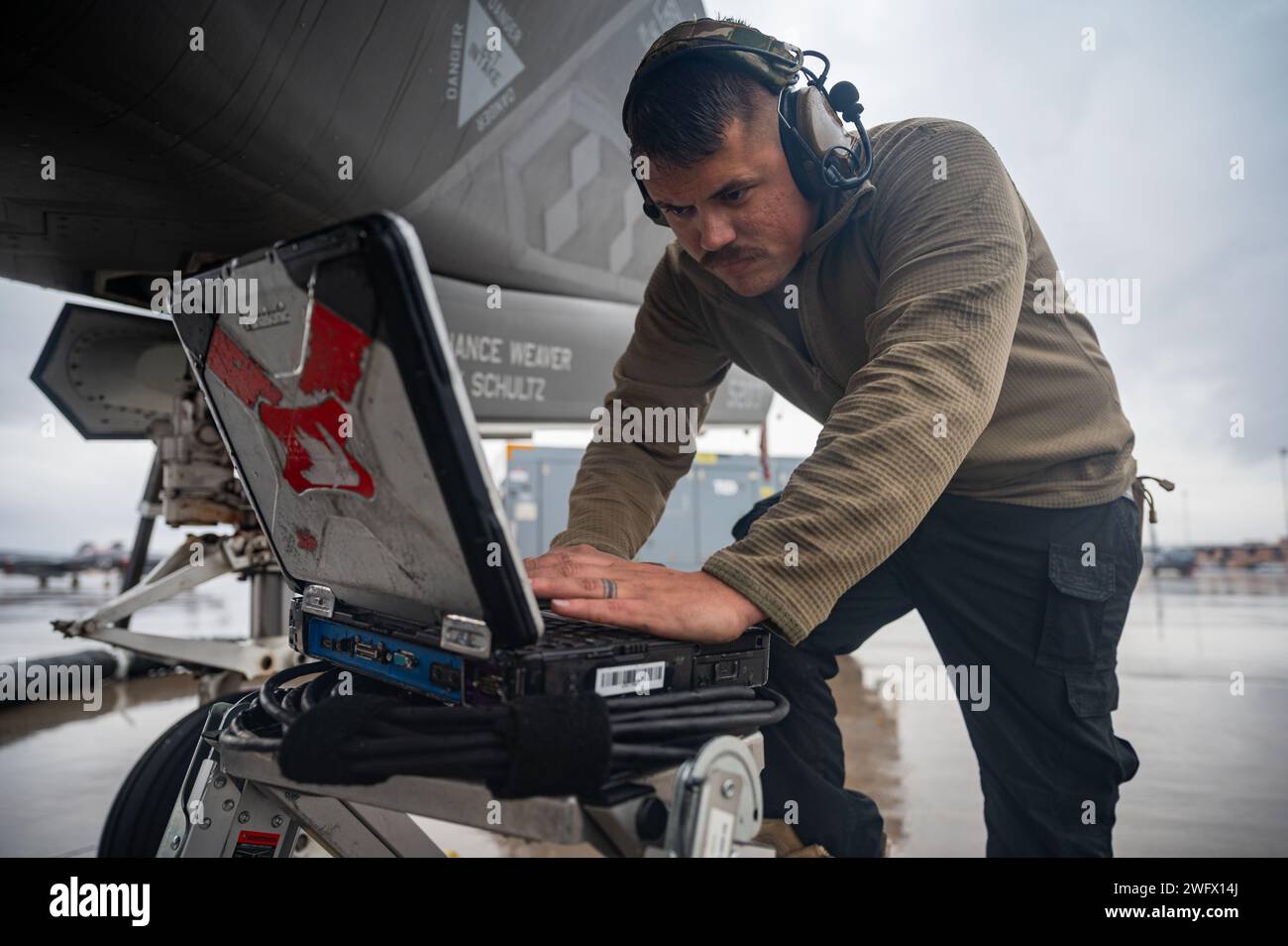 U.S. Air Force Staff Sgt. Kyle Lind, a crew chief assigned to the 421st ...