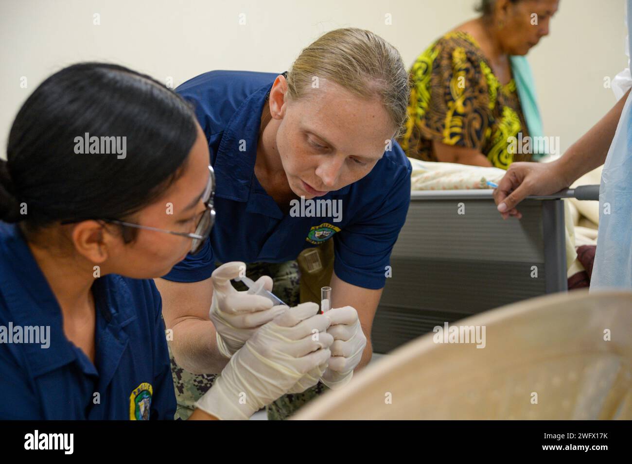 U.S. Navy Lt. j.g. Ginger Myers, from Phoenix, middle, and Hospital ...