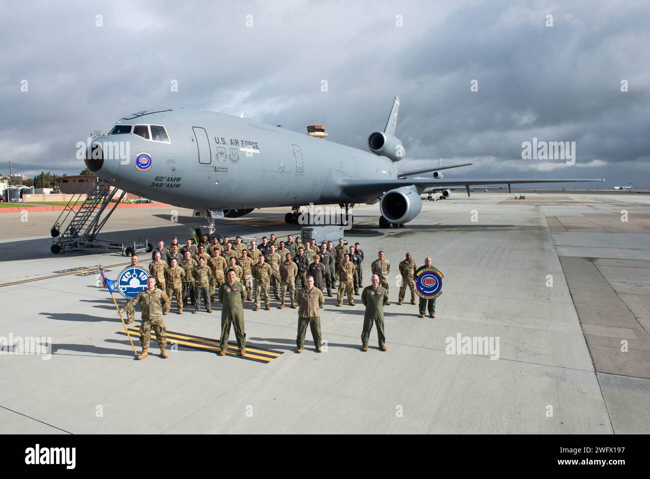 U.S. Airmen assigned to the 9th Air Refueling Squadron pose for a group ...