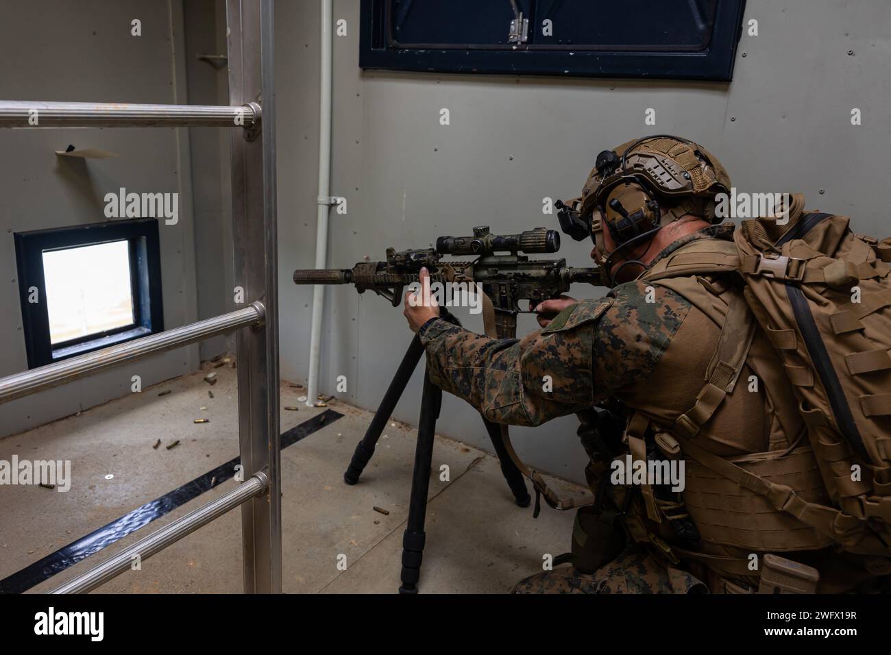 U.S. Marine Corps Cpl. Wyatt Darnell, a scout sniper with Battalion Landing Team 1/1, 31st ...