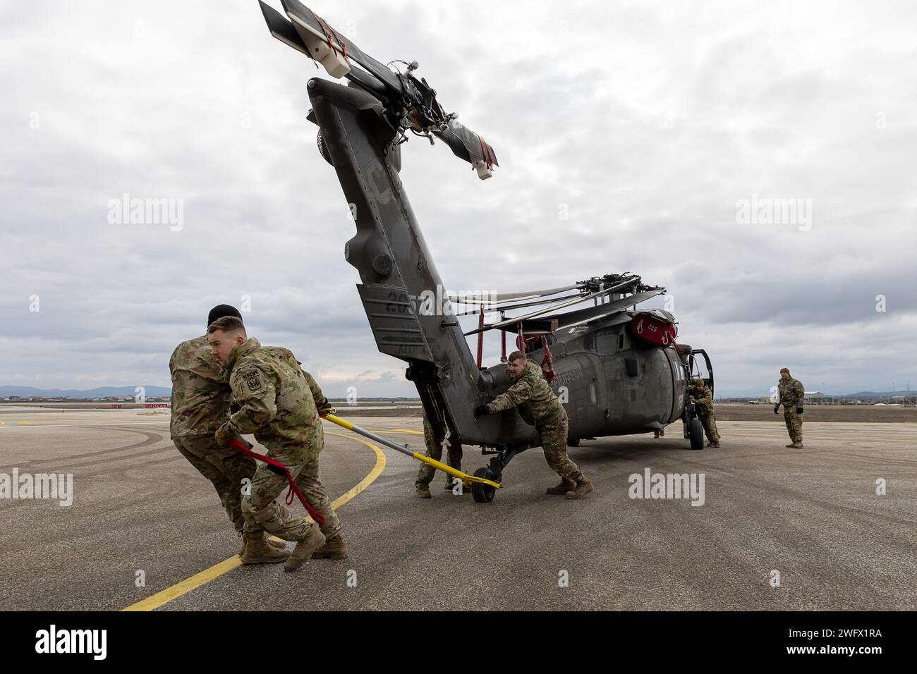 Members of 1st Battalion, 126th Aviation Regiment retrograde nine UH-60 ...