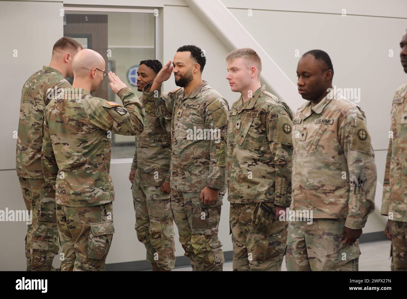 11 Soldiers of the 35th Infantry Division Artillery were promoted to ...