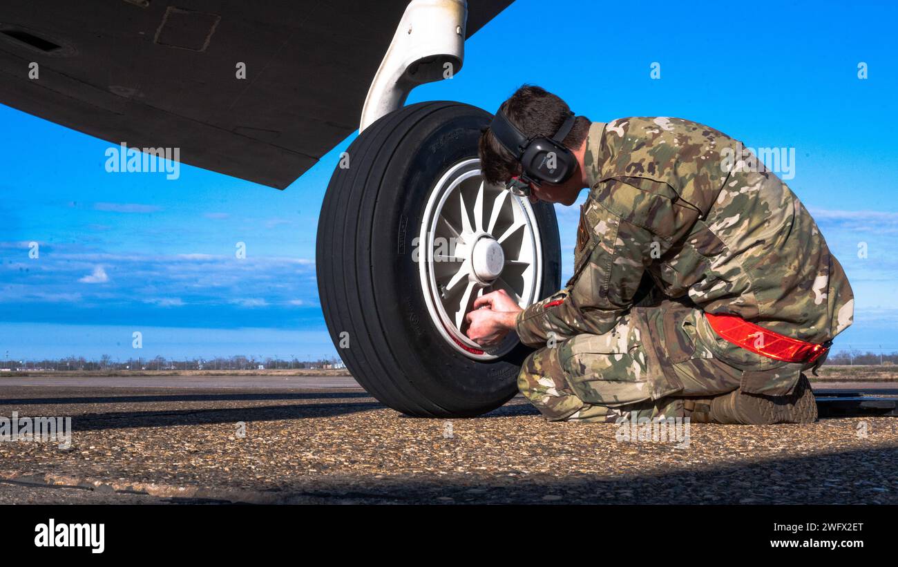 Airman Carson Gold, 96th Aircraft Maintenance Unit crew chief, checks ...