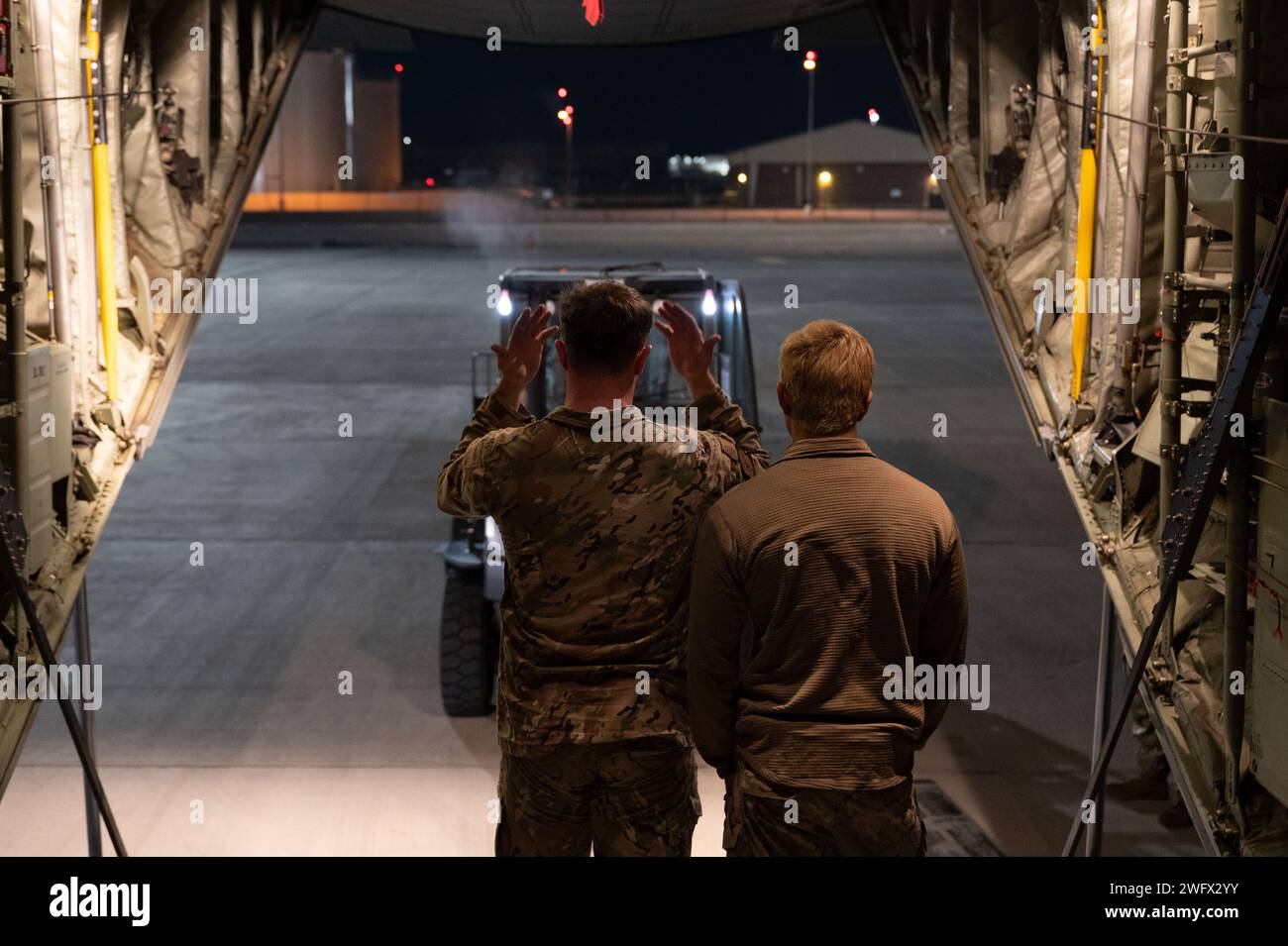 U.S. Air Force Airman 1st First Class Dylan Brown, left, and Senior ...