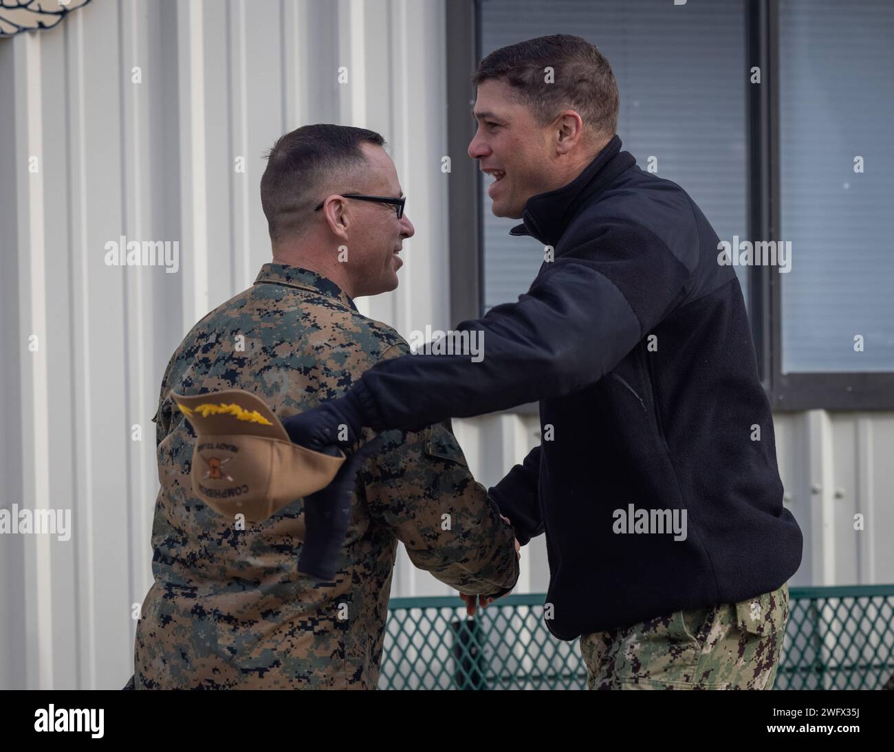 U.S. Marine Corps Sgt. Maj. Jared Game, left, sergeant major, 24th ...