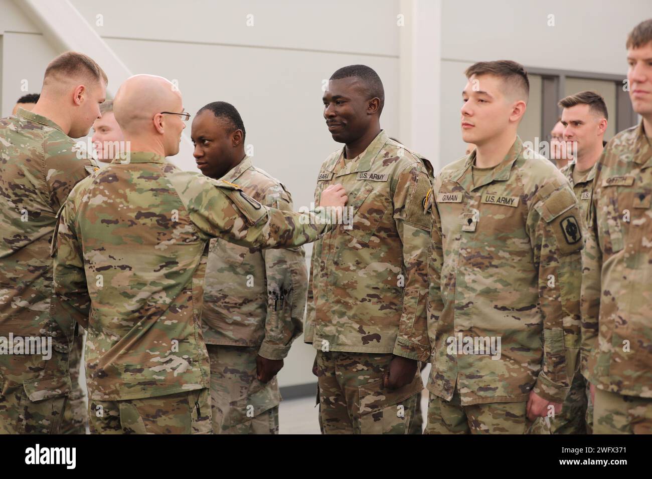 11 Soldiers of the 35th Infantry Division Artillery were promoted to ...