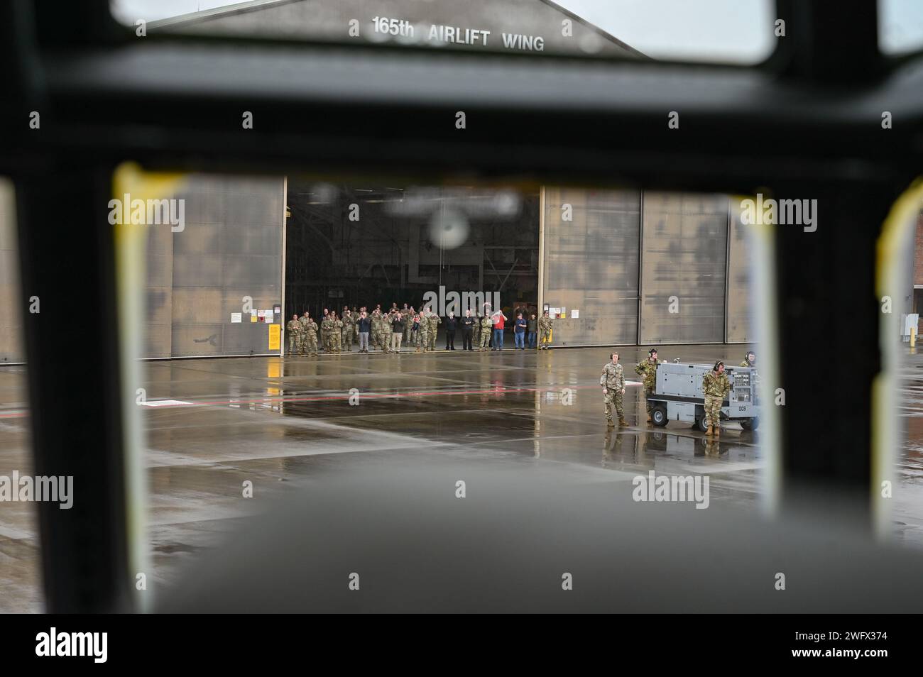 U.S. Air Force Airmen and family members from the 165th Airlift Wing ...