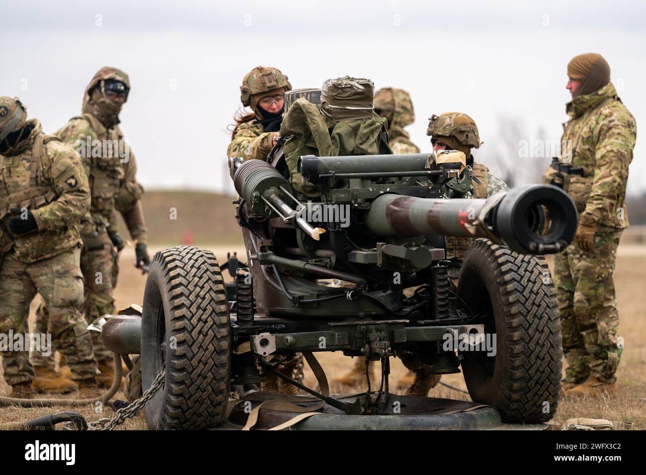 Artillery Soldiers with Alpha "Gator" Battery, 3rd Battalion, 320th Field Artillery Regiment ...