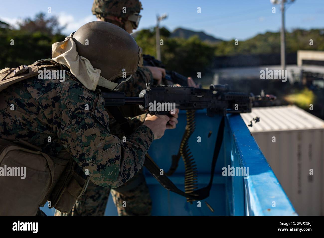 U.S. Marine Corps Lance Cpl. Cameron Bailey, a small arms repair ...