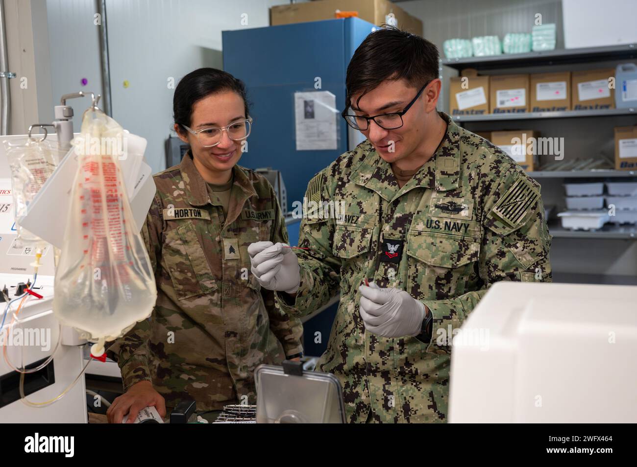 U s navy hospital corpsman demonstrates hi-res stock photography and ...