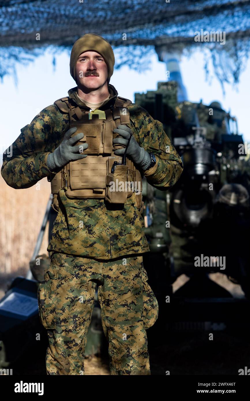 U.S. Marine Corps Sgt. Nicholas Robertson, a field artillery section ...