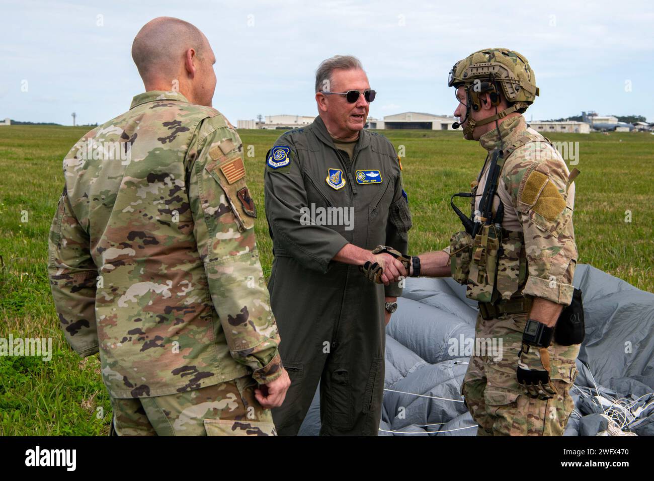 U.S. Air Force Lt. Gen. Ricky Rupp, center, U.S. Forces Japan and Fifth ...