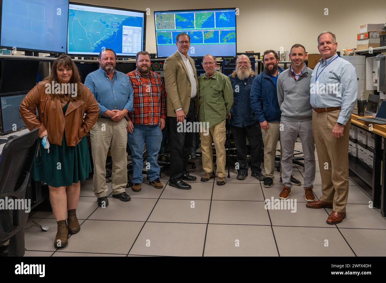 Members of the Meteorological and Oceanographic Systems team pose for a ...