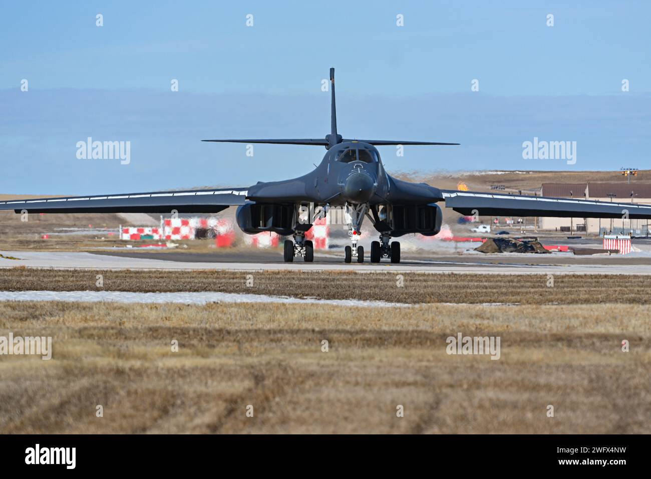 A B-1B Lancer assigned to the 37th Bomb Squadron taxis on the ...