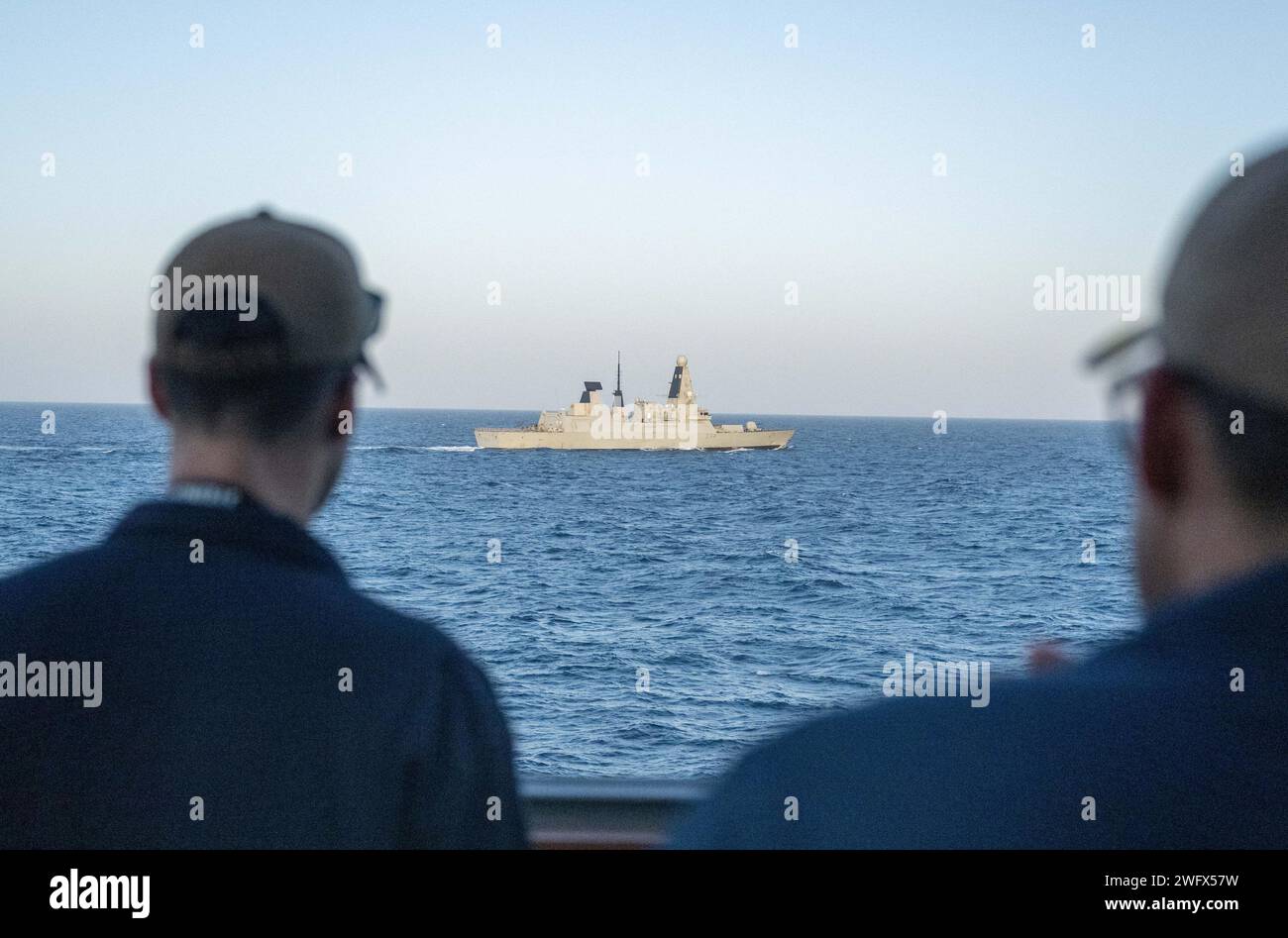 240113-N-CK669-1003 RED SEA (Jan. 13, 2024) Sailors stand watch while ...