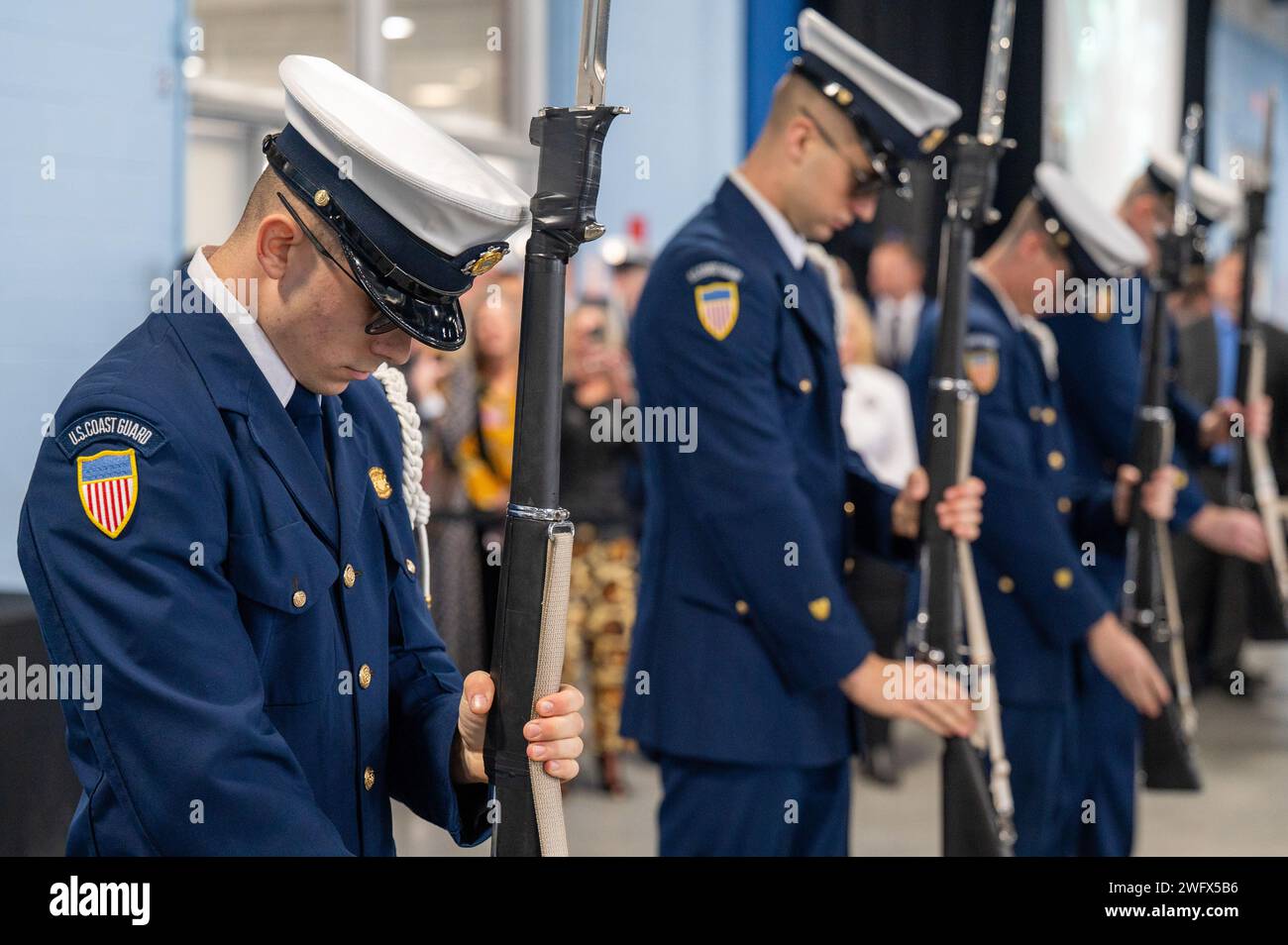 Members of the U.S. Coast Guard Silent Drill Team prepare for a ...