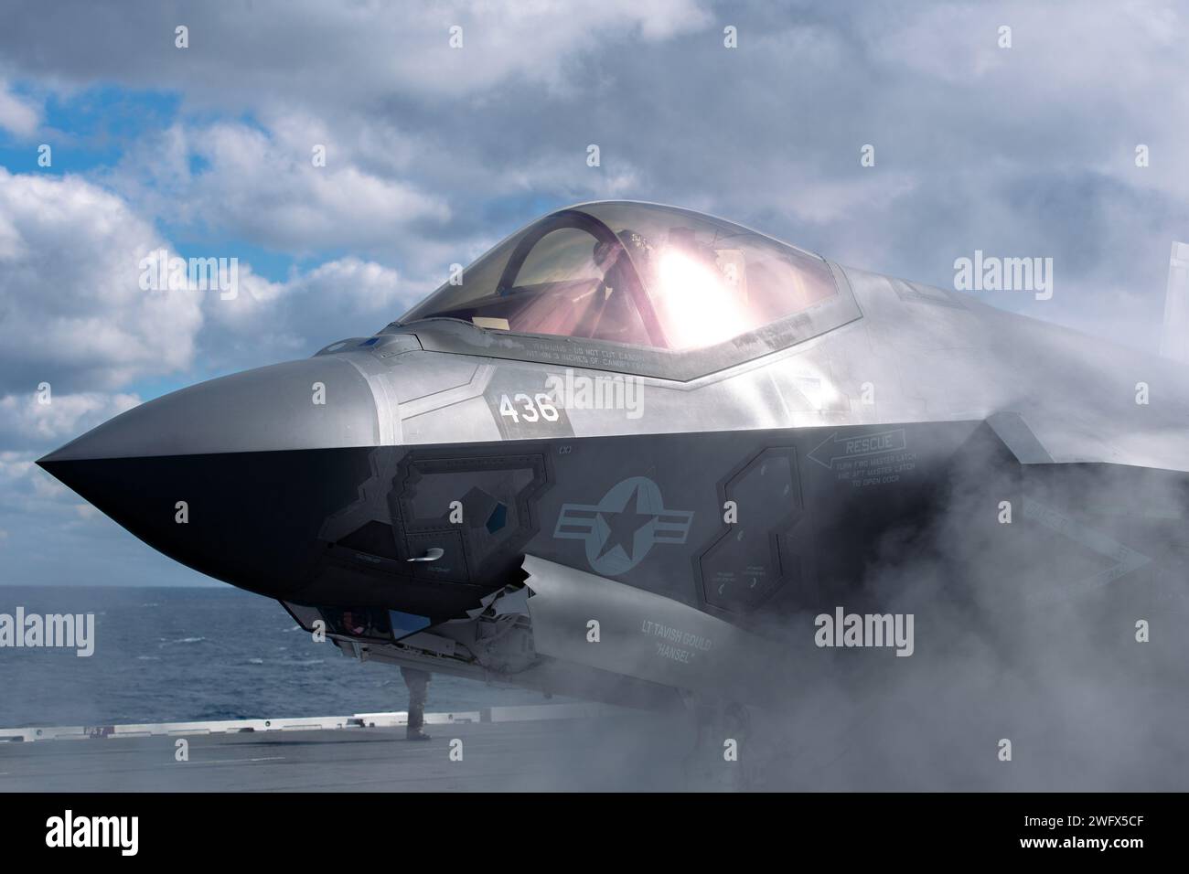 An F-35C Lightning II assigned to Strike Fighter Squadron (VFA) 147 taxis on the flight deck of ...