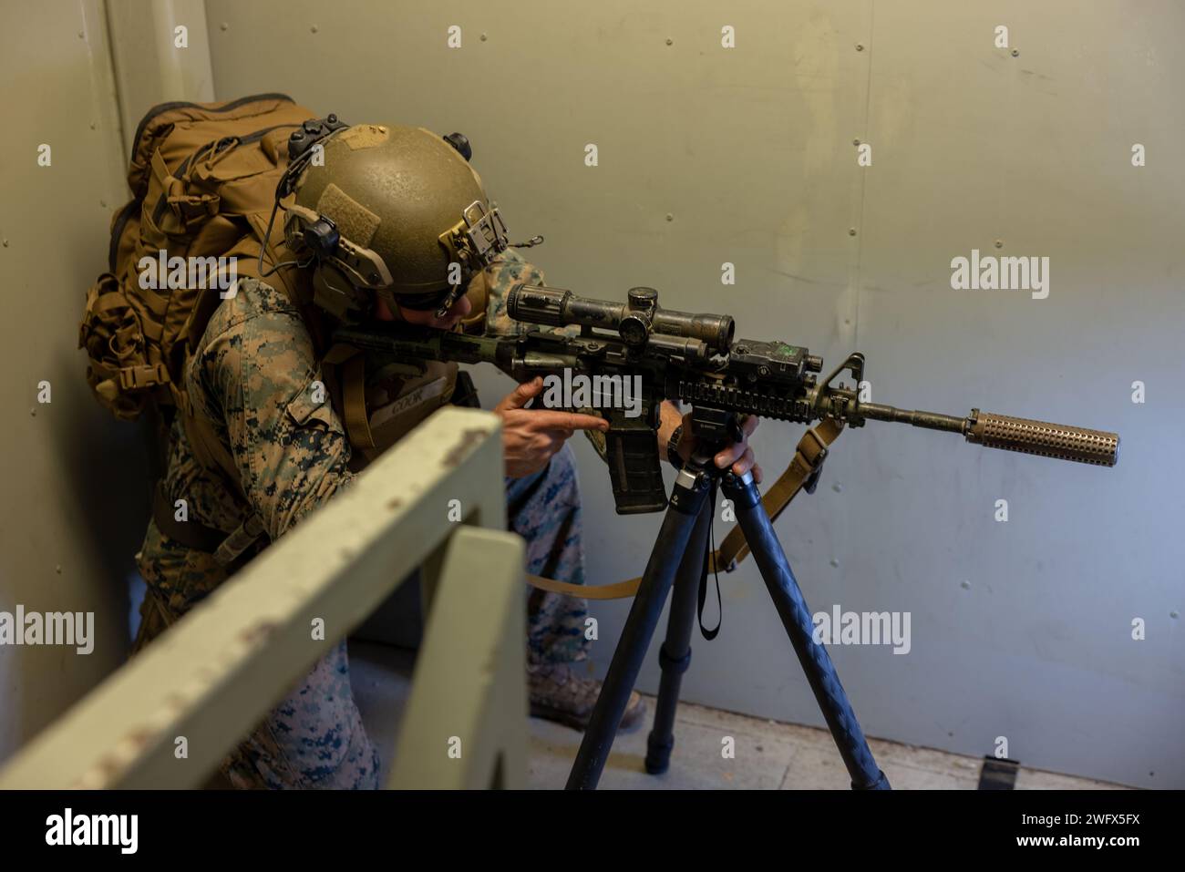 U.S. Marine Corps Sgt. Kyle Cook, a scout sniper with Battalion Landing Team 1/1, 31st Marine ...