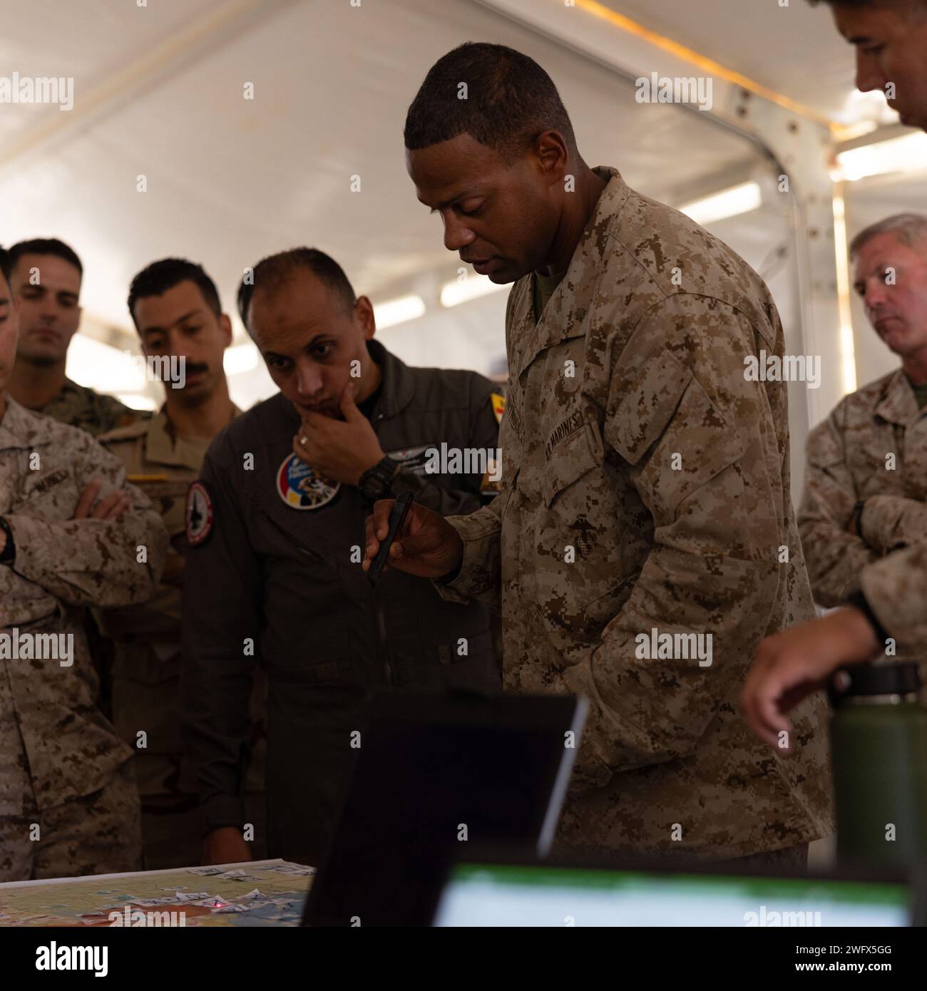 U.S. Marines and partner nation service members participate in an ...