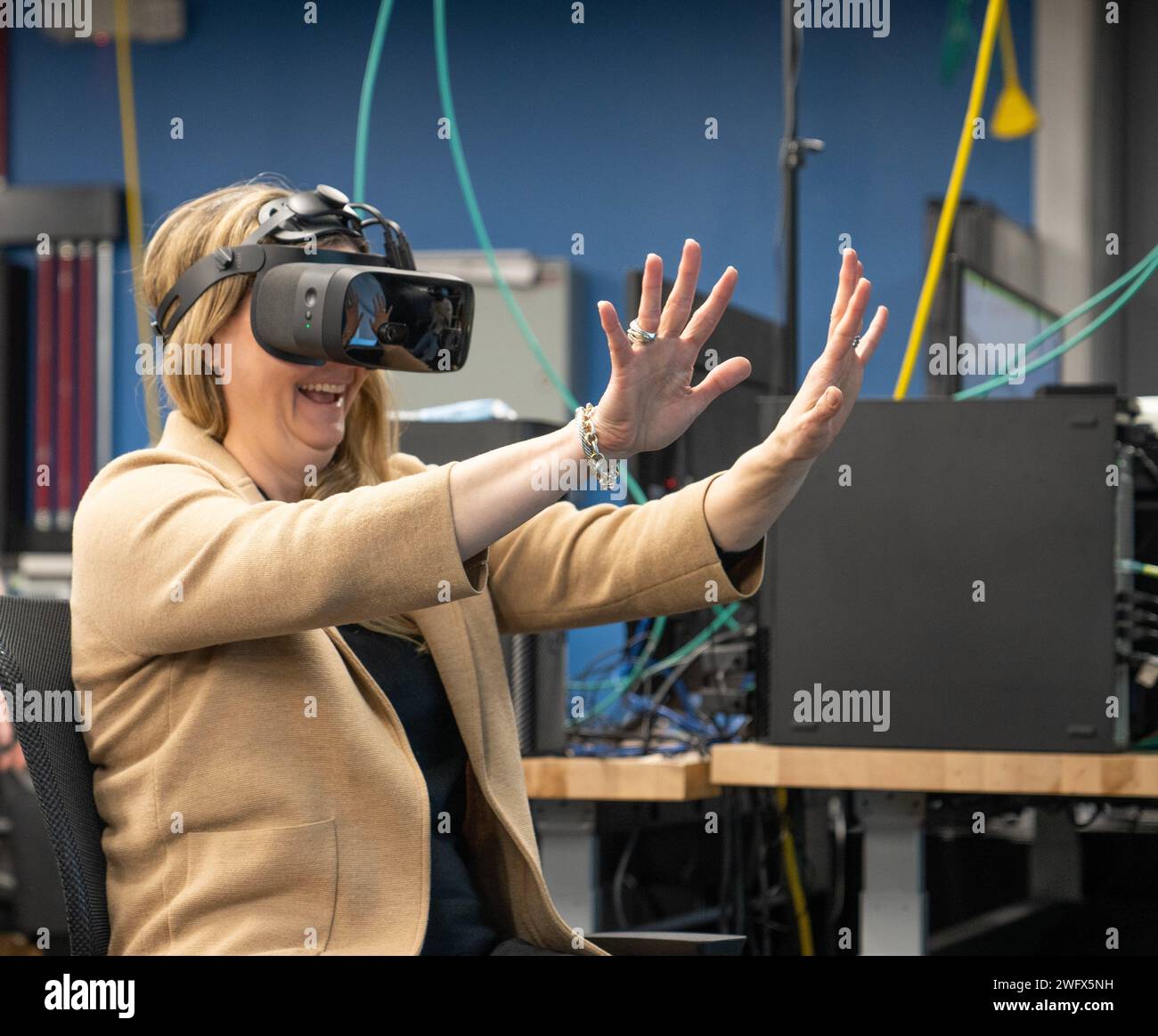 Jamie Miller, CEO and regional dean of Northeastern University Arlington, toured the Augmented ...