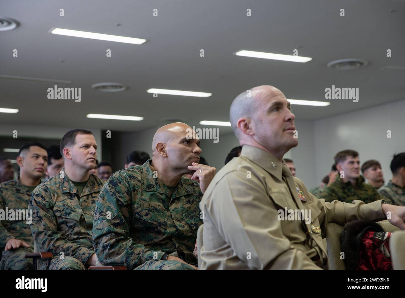 U.S. Marines from Marine Corps Air Station Iwakuni watch a ...