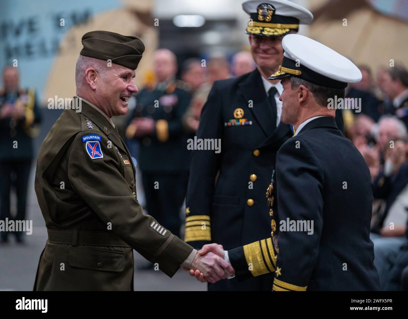 Vice Adm. Doug Perry, right shakes hands with NATO’s Supreme Allied ...