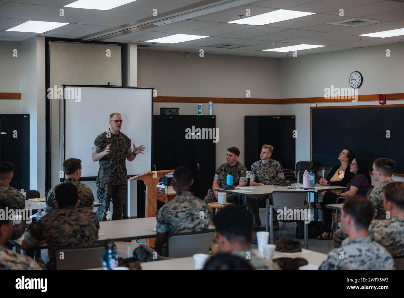 U.S. Navy Rear Adm. Carey H. Cash speaks to the U.S. Marines with 3d ...