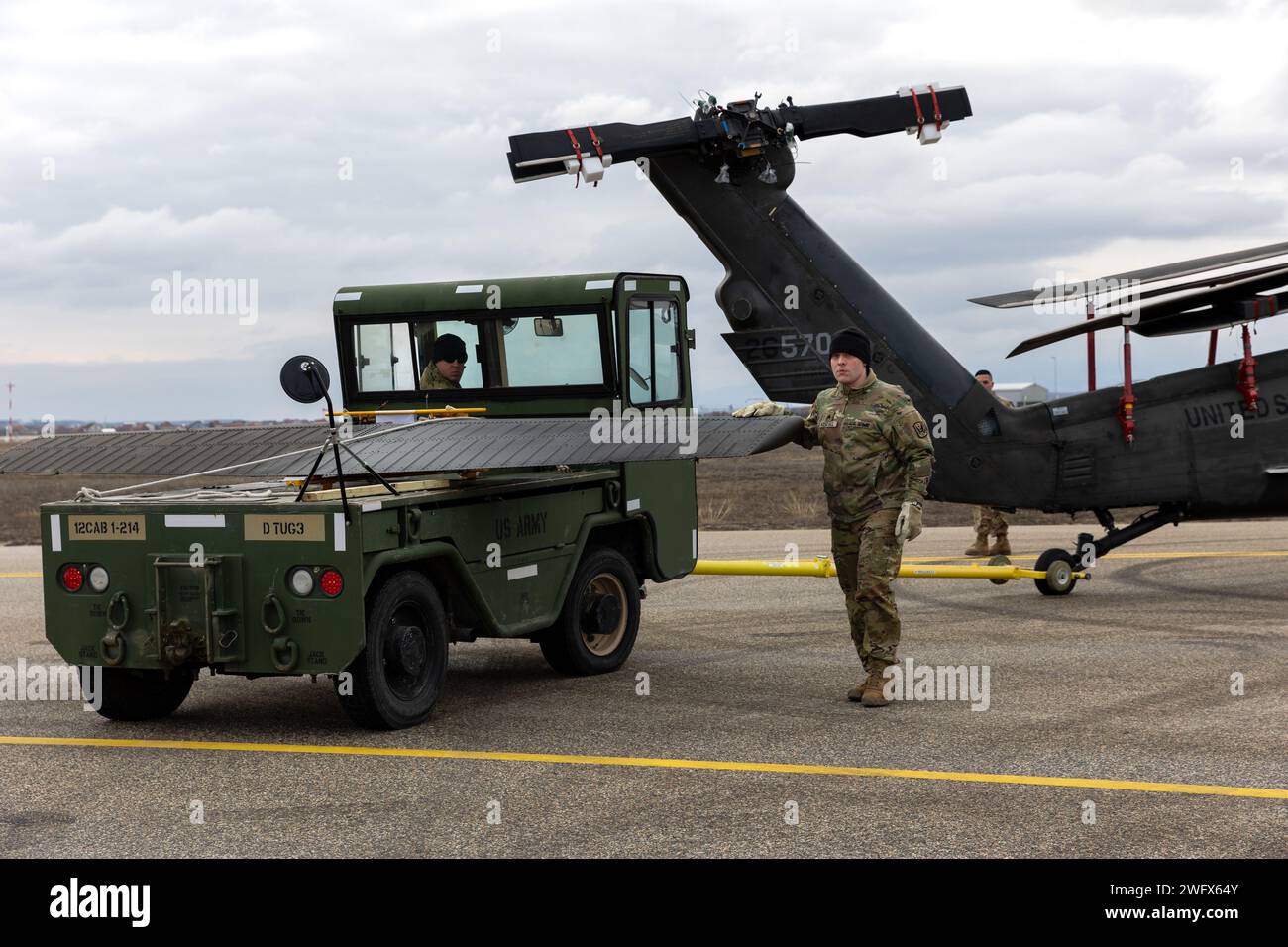 Members of 1st Battalion, 126th Aviation Regiment retrograde nine UH-60 ...