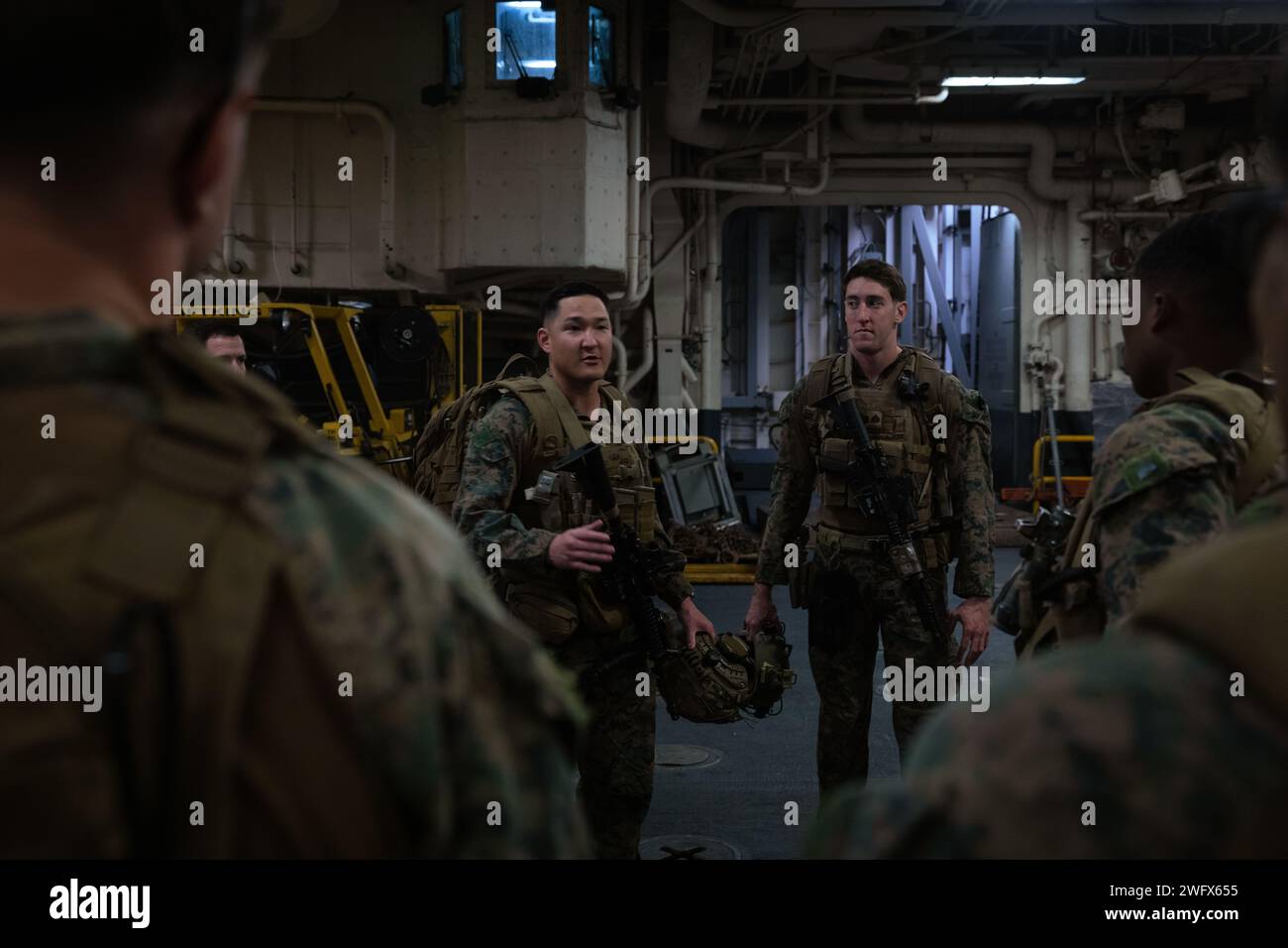 U.S. Marine Corps Gunnery Sgt. Thomas Gary, left, an explosive ...