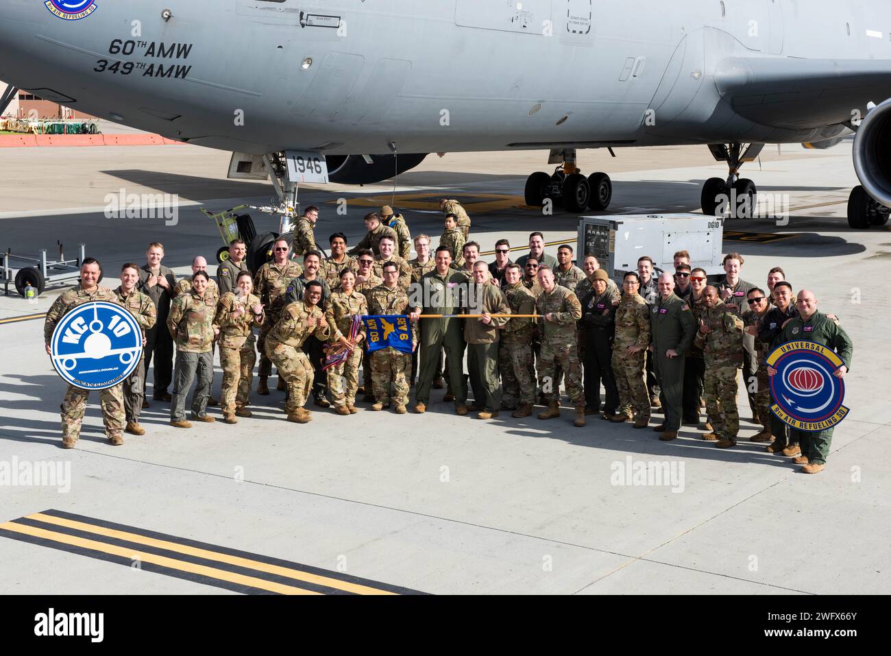U.S. Airmen assigned to the 9th Air Refueling Squadron pose for a group ...