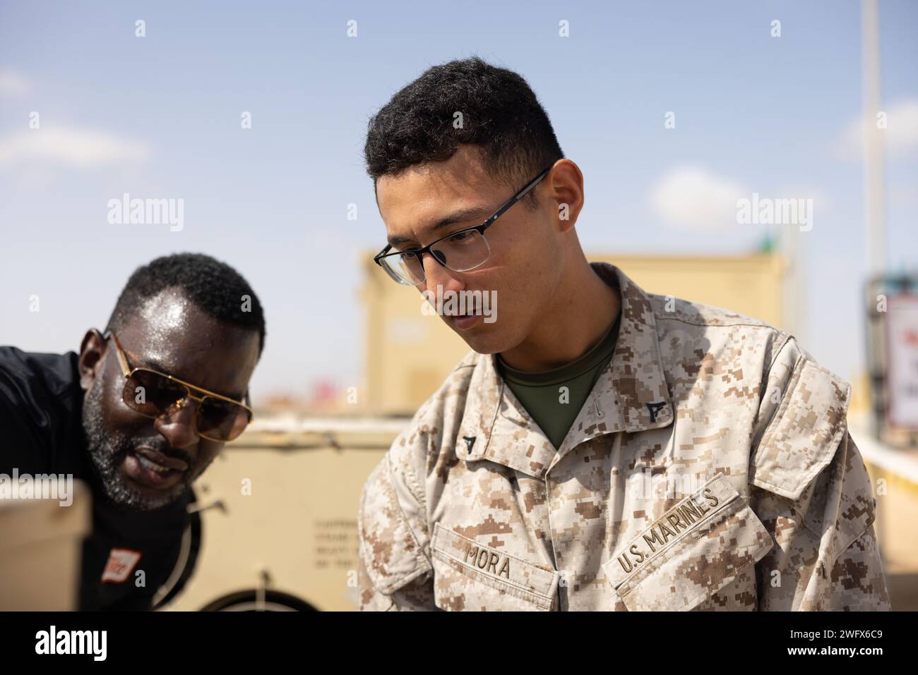 U.S. Marine Corps Lance Cpl. Hector Mora, a radio operator assigned to ...