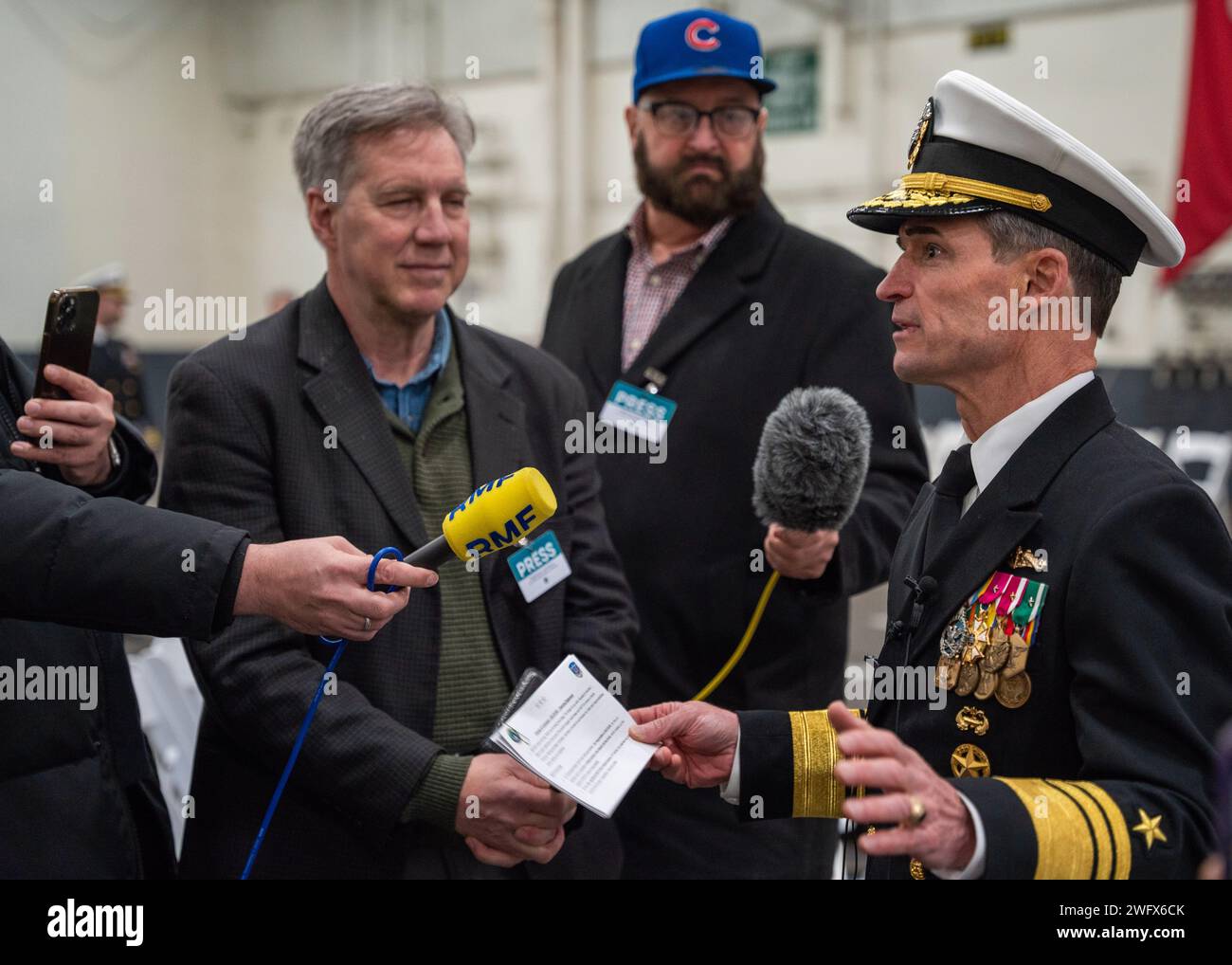 Vice Adm. Doug Perry conducts an interview with media members following a change of command ...