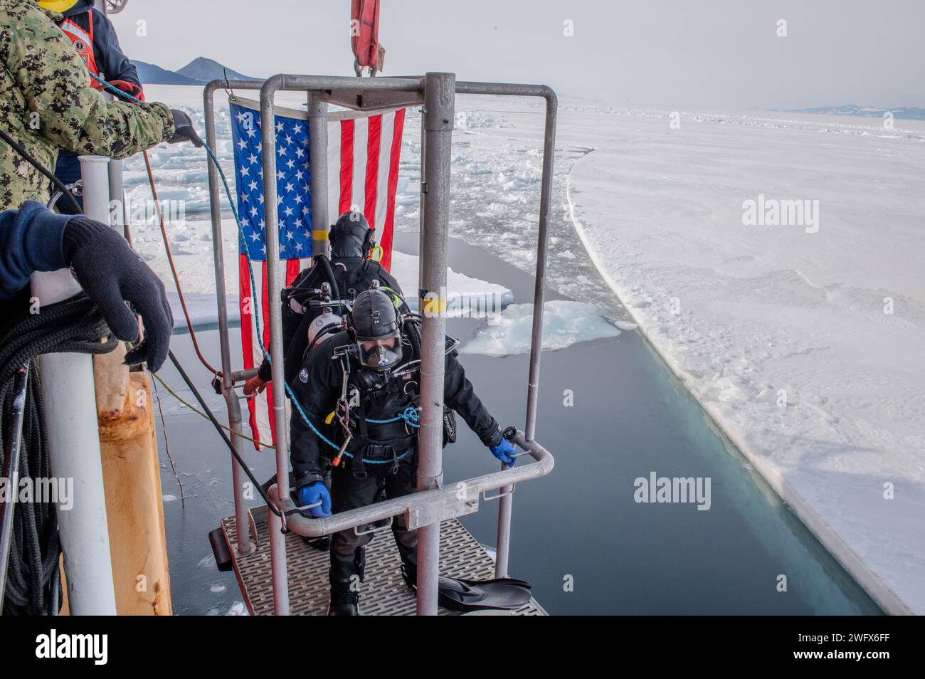 U.S. Coast Guard Petty Officer 1st Class Ryan Miller, and Petty Officer ...