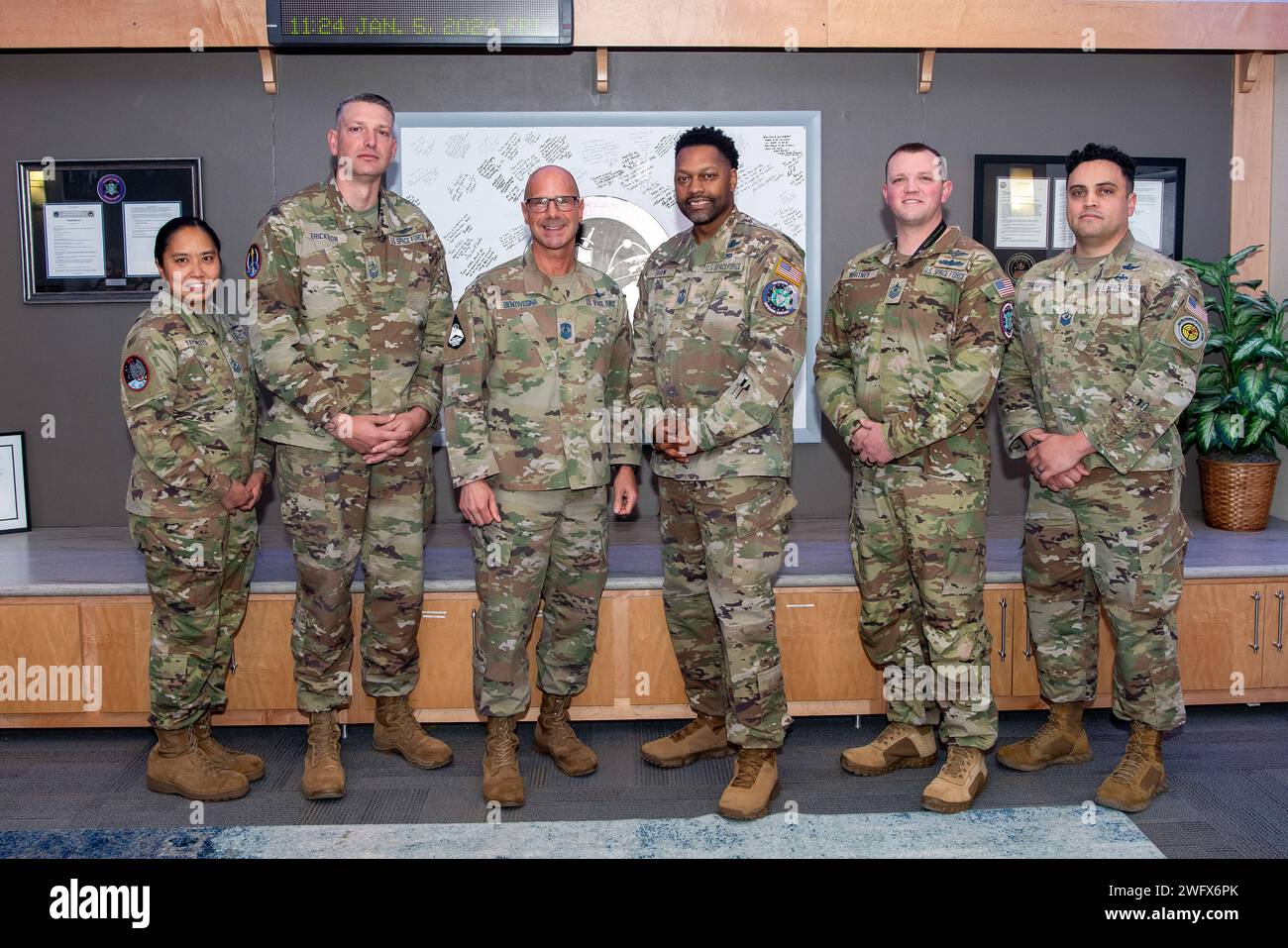 Chief Master Sergeant of the Space Force John F. Bentivegna poses for a photo with senior ...
