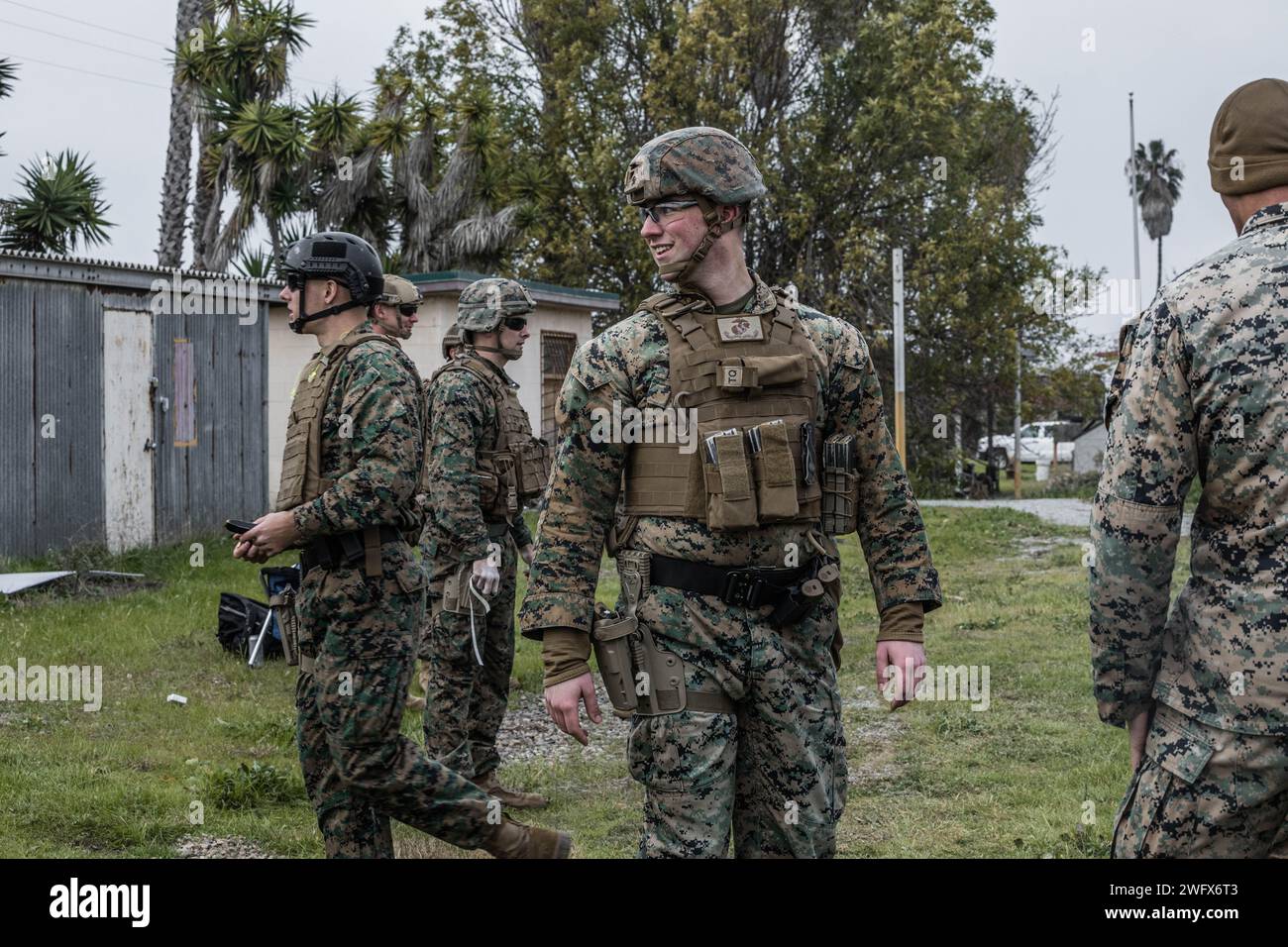 U.S. Marine Corps Cpl. Alexander Devereux, a combat photographer, with Headquarters and Service ...