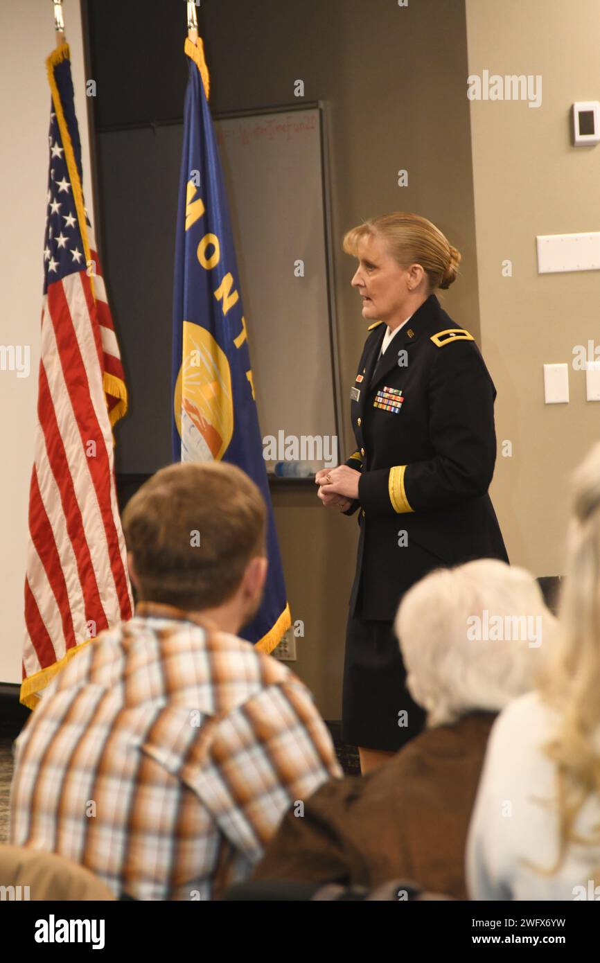 Brigadier General Renea Dorvall addresses attendees at a promotion ...