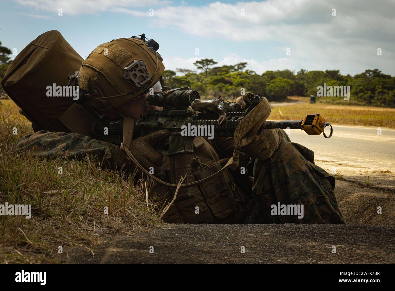 U.S. Marine Corps Lance Cpl. James Riley, an infantry Marine with Battalion Landing Team 1/1 ...