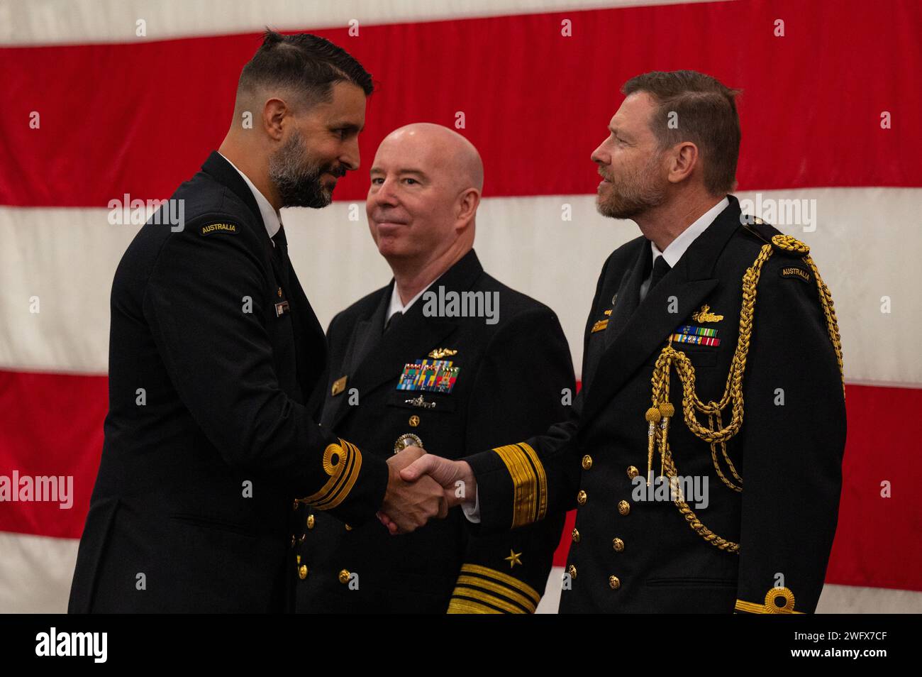 Royal Australian Navy Lt. Cmdr. Adam Klyne (left), U.S. Navy’s Nuclear ...