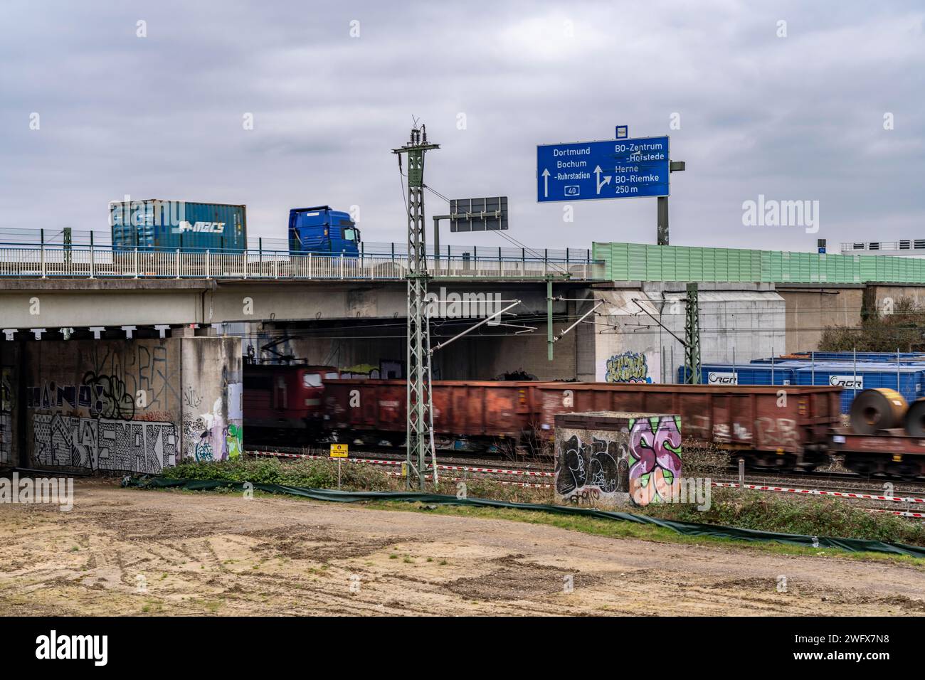 Freeway bridge of the A40, over a 3-track railroad line, between Bochum ...