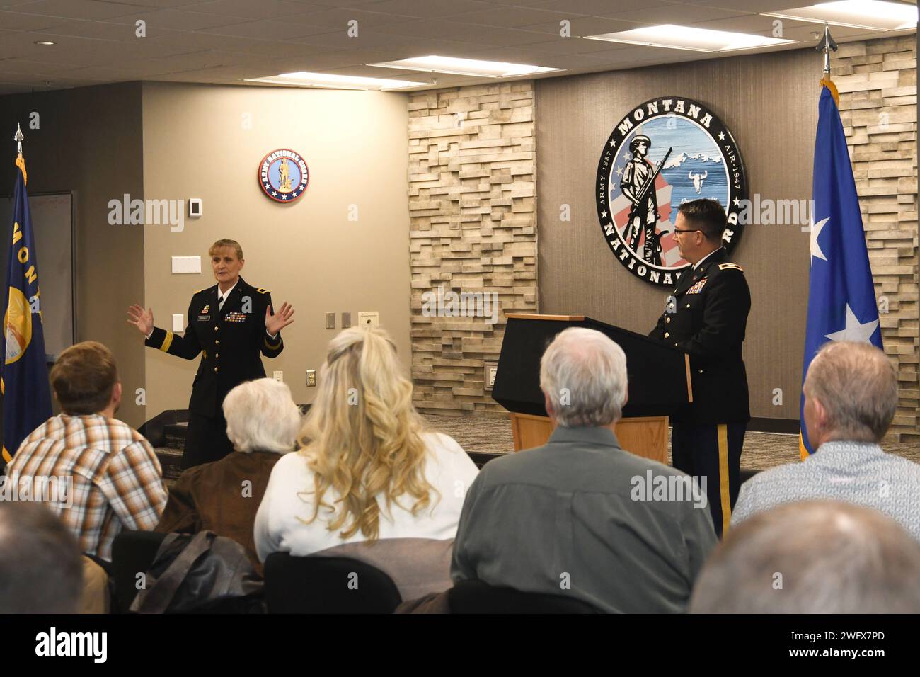 Brigadier General Renea Dorvall addresses attendees at a promotion ...