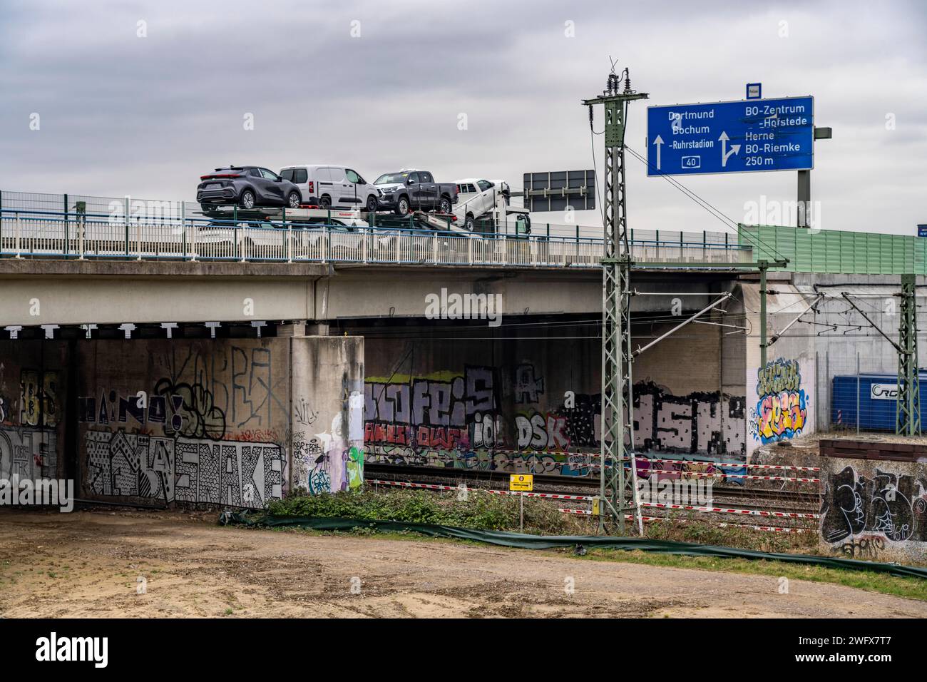 Freeway bridge of the A40, over a 3-track railroad line, between Bochum ...