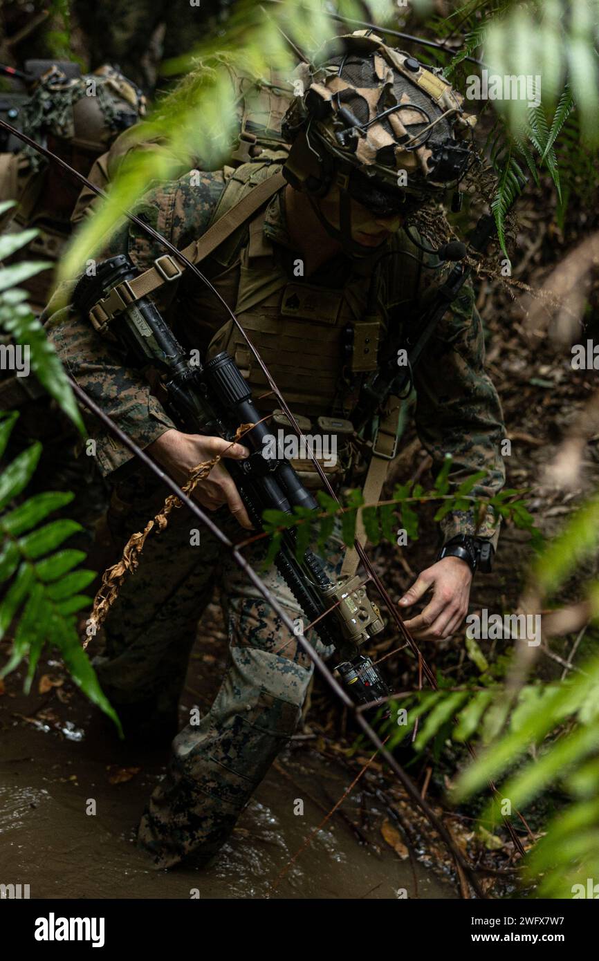 U.S. Marine Corps Sgt. Cody Merson patrols in the jungle during the 3d ...