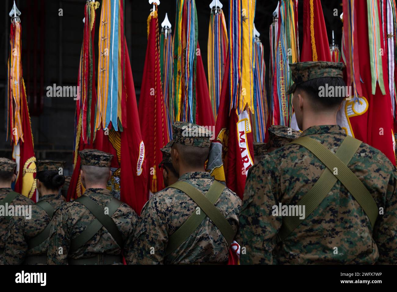 U.S. Marines with III Marine Expeditionary Force hold colors during the ...