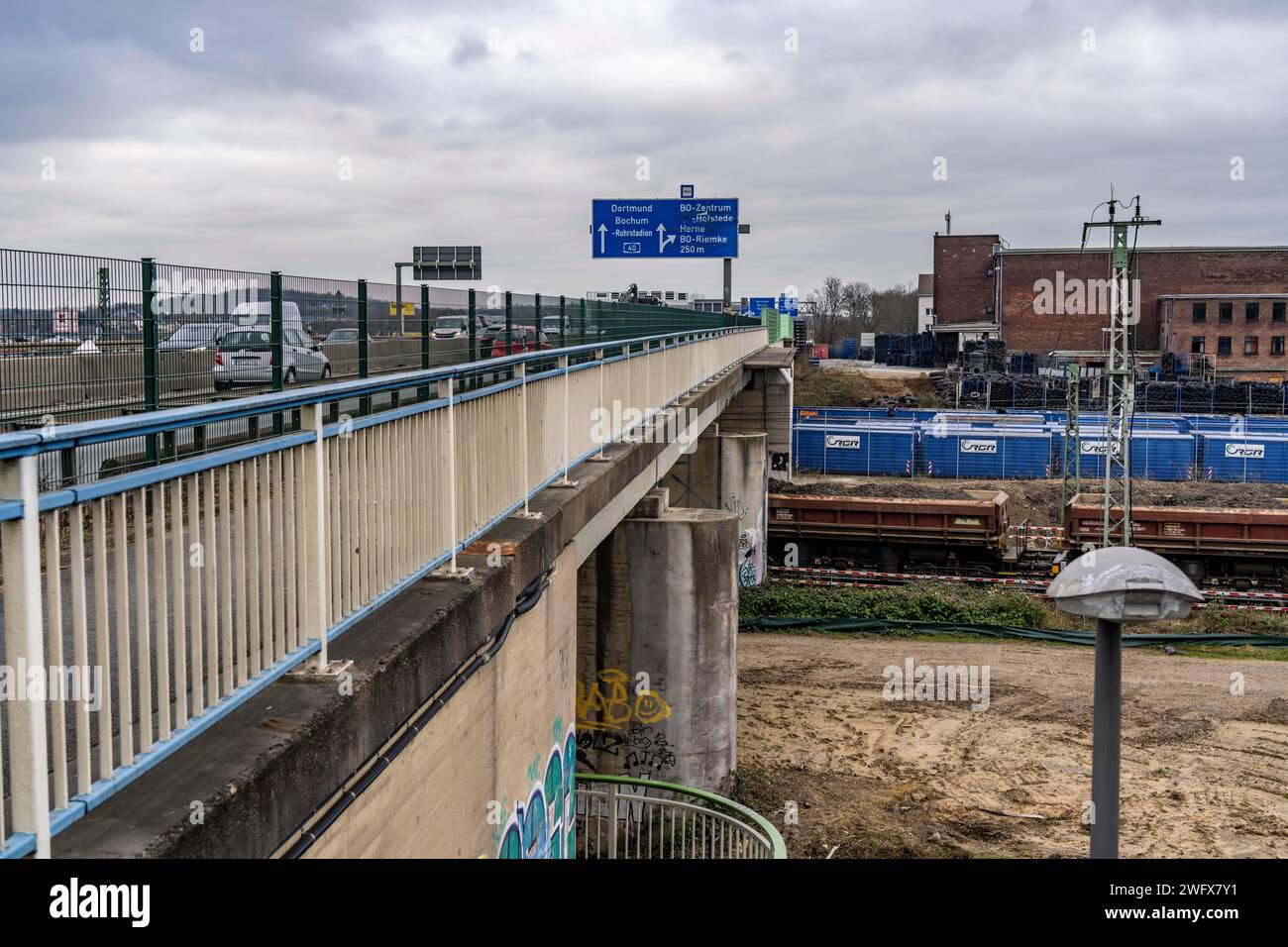Freeway bridge of the A40, over a 3-track railroad line, between Bochum ...