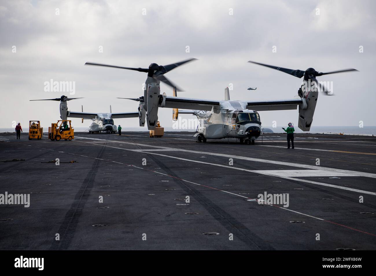230901-N-ZQ263-1002 PACIFIC OCEAN (Sept. 1, 2023) Sailors load cargo ...
