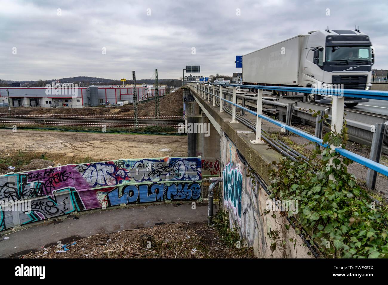 Freeway bridge of the A40, over a 3-track railroad line, between Bochum ...
