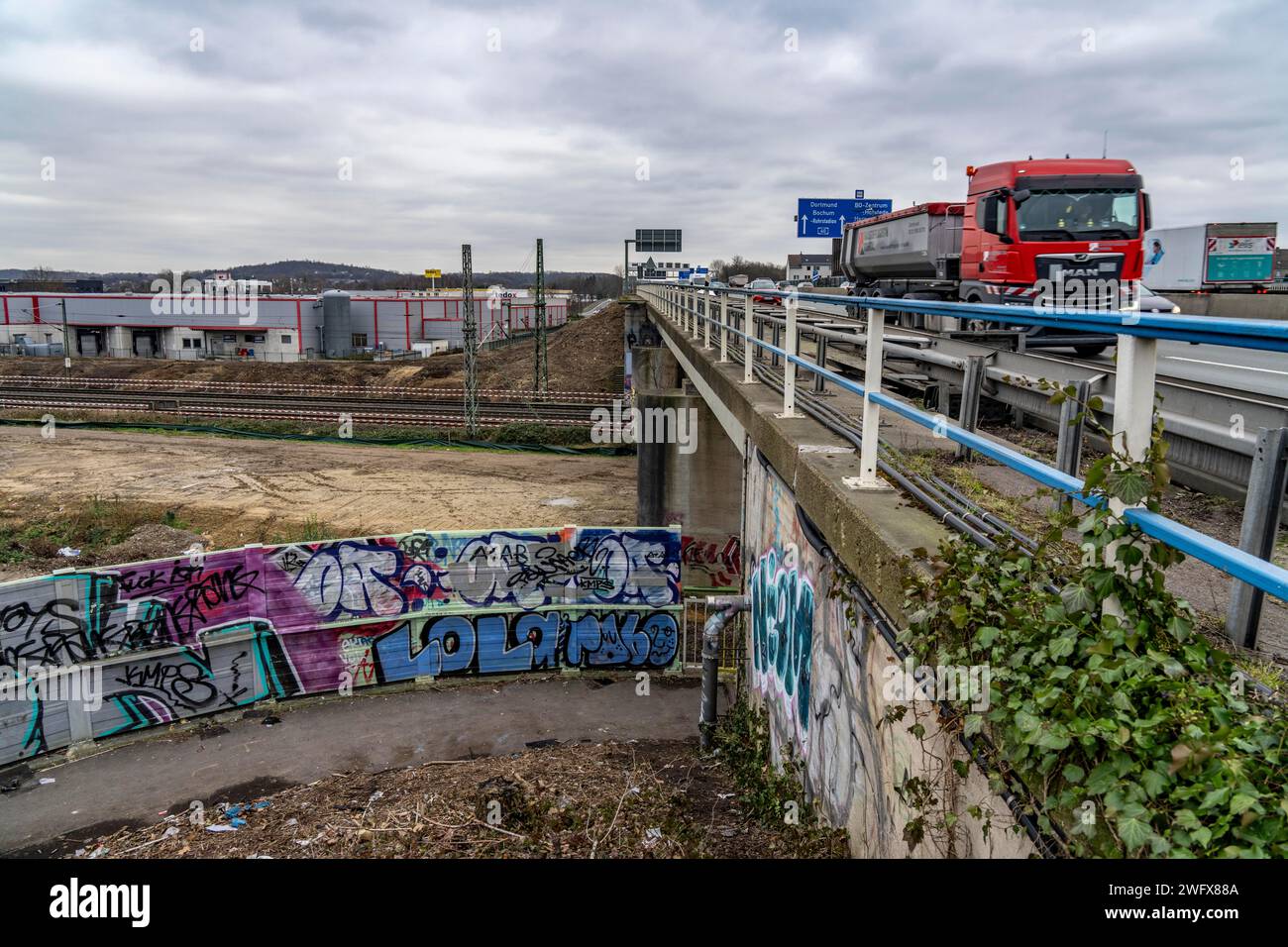 Freeway bridge of the A40, over a 3-track railroad line, between Bochum ...