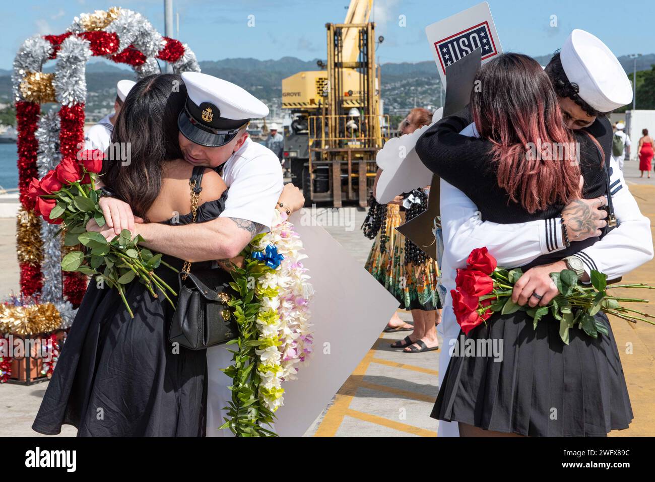 JOINT BASE PEARL HARBOR-HICKAM (Jan. 31, 2024) — Sailors embrace their ...