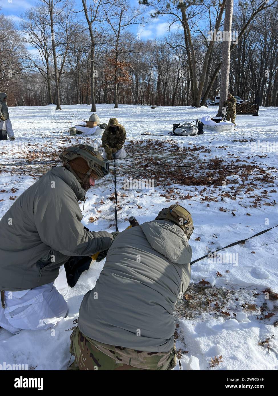 Air National Guard Security Forces specialists build an arctic tent ...