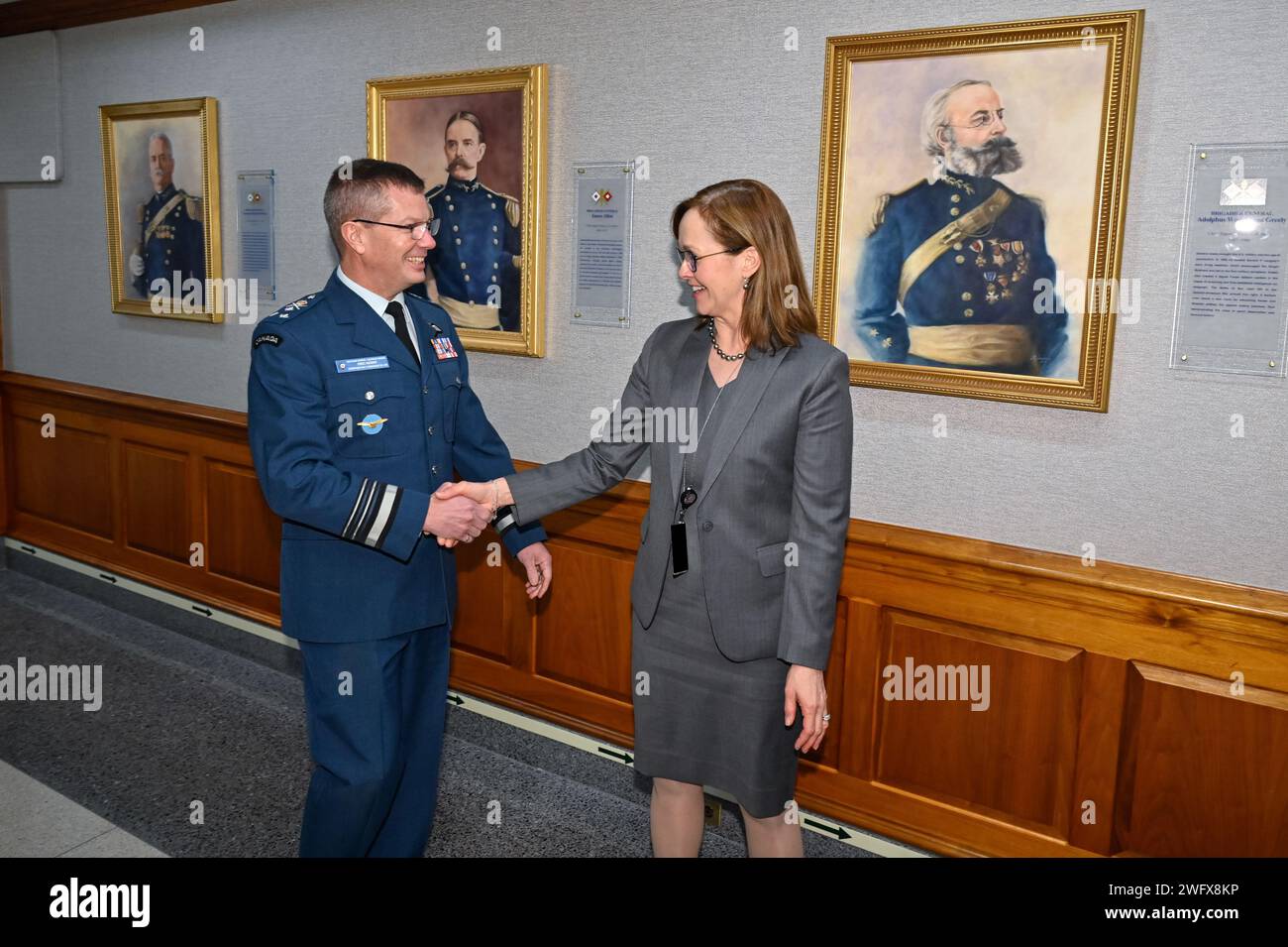 Royal Canadian Air Force Commander Lt. Gen. Eric Kenny greets Kelli ...